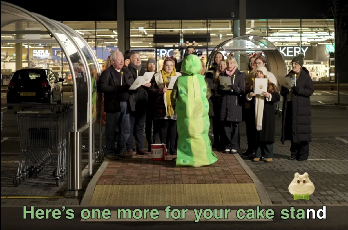 Aldi Promotes Its 'Merry Cuthbert' Cake Outside M&S | DesignRush